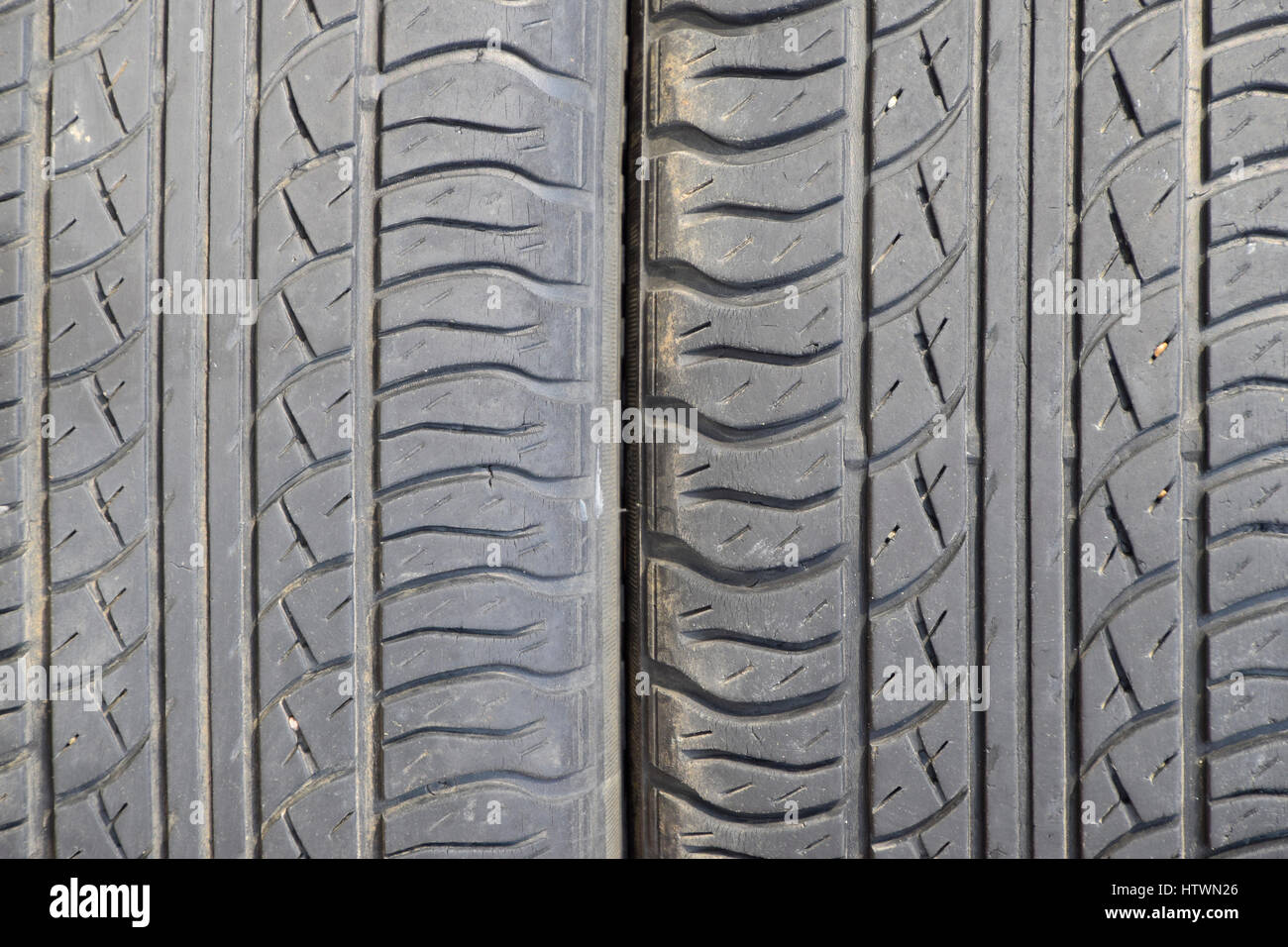 The background of the tread pattern of the car wheel. Rubber tires ...