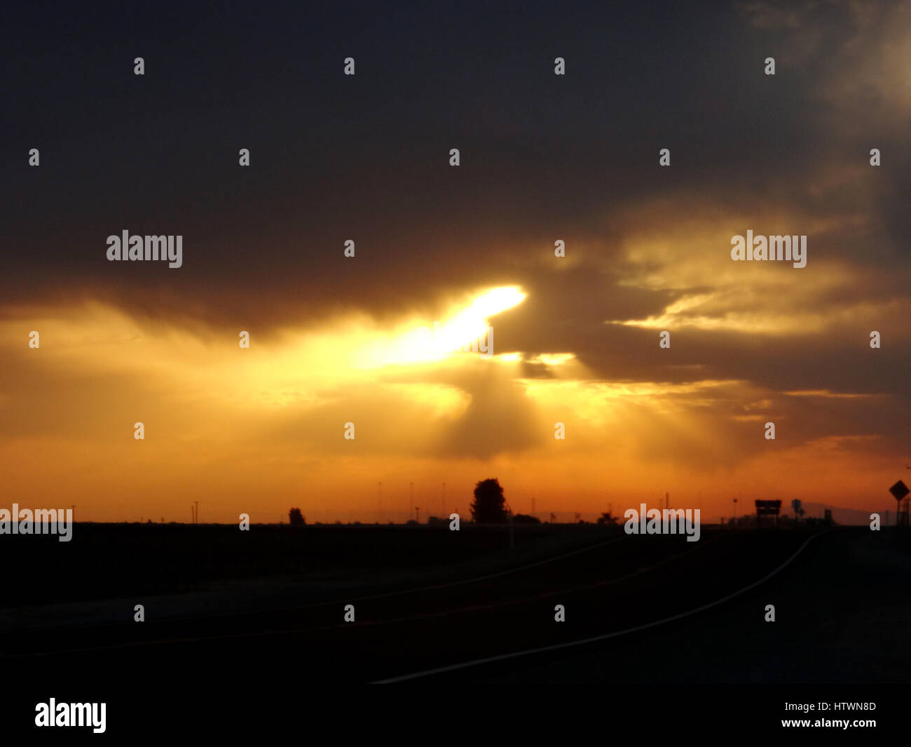 Dark orange and yellow sunset Stock Photo - Alamy