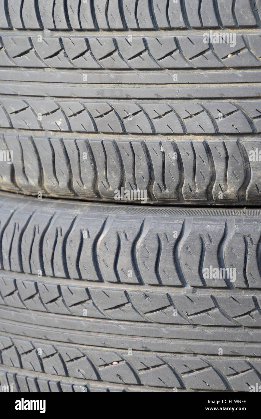 The background of the tread pattern of the car wheel. Rubber tires ...