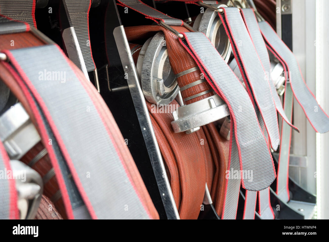 fire hoses with Storz couplings on board a fire engine Stock Photo - Alamy