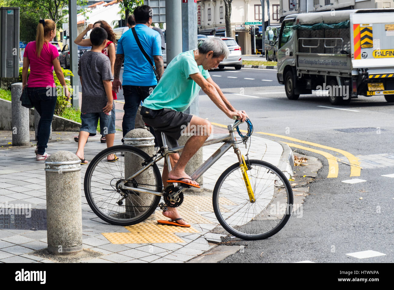 Male cyclist walking with bike hi-res stock photography and images - Alamy