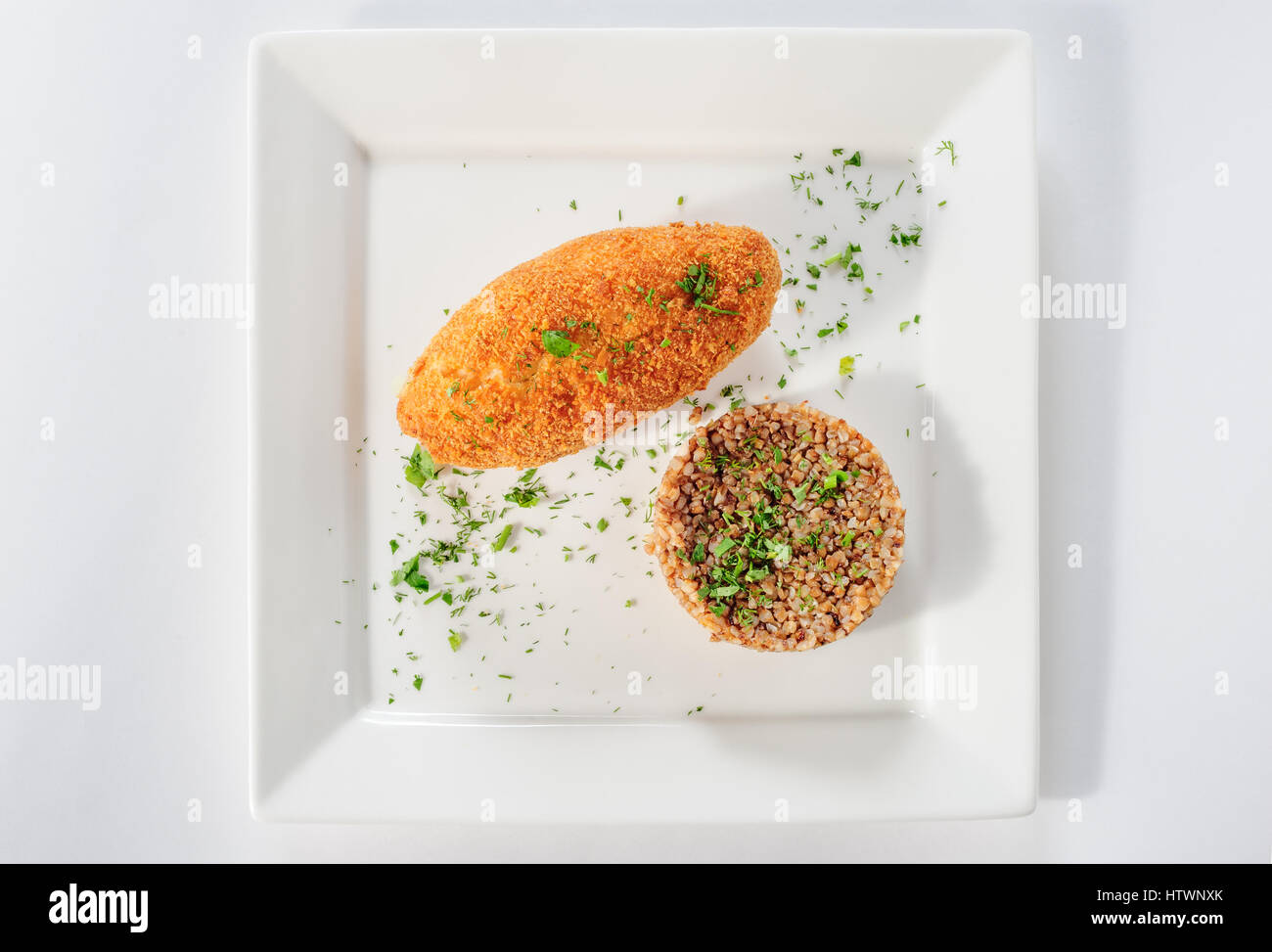 Cutlet of turkey meat with buckwheat cereal Stock Photo - Alamy