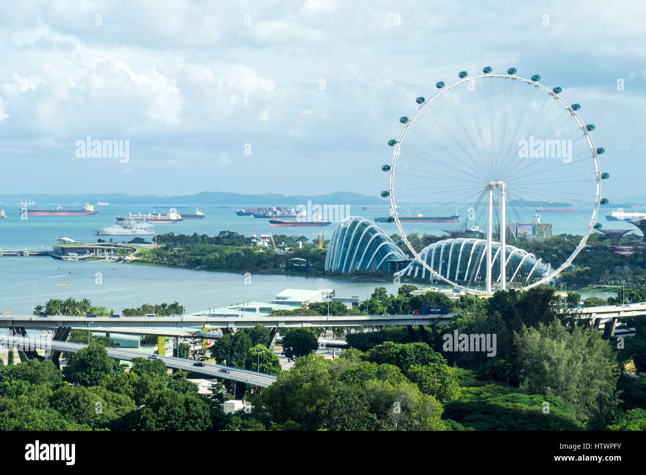 The Singapore Flyer, a giant ferris wheel, next to Gardens By The Bay ...