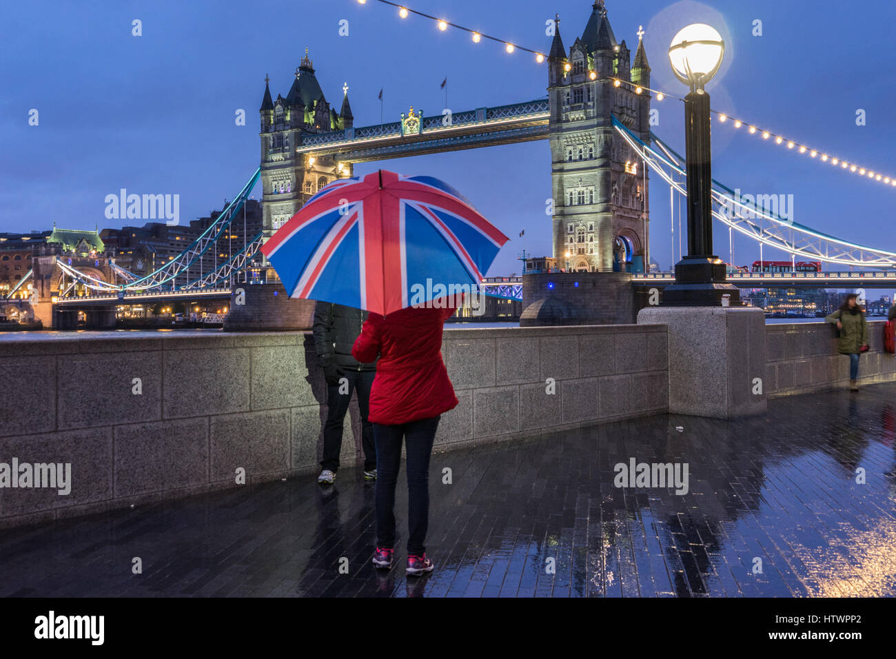 Sheltering from rain hi-res stock photography and images - Alamy