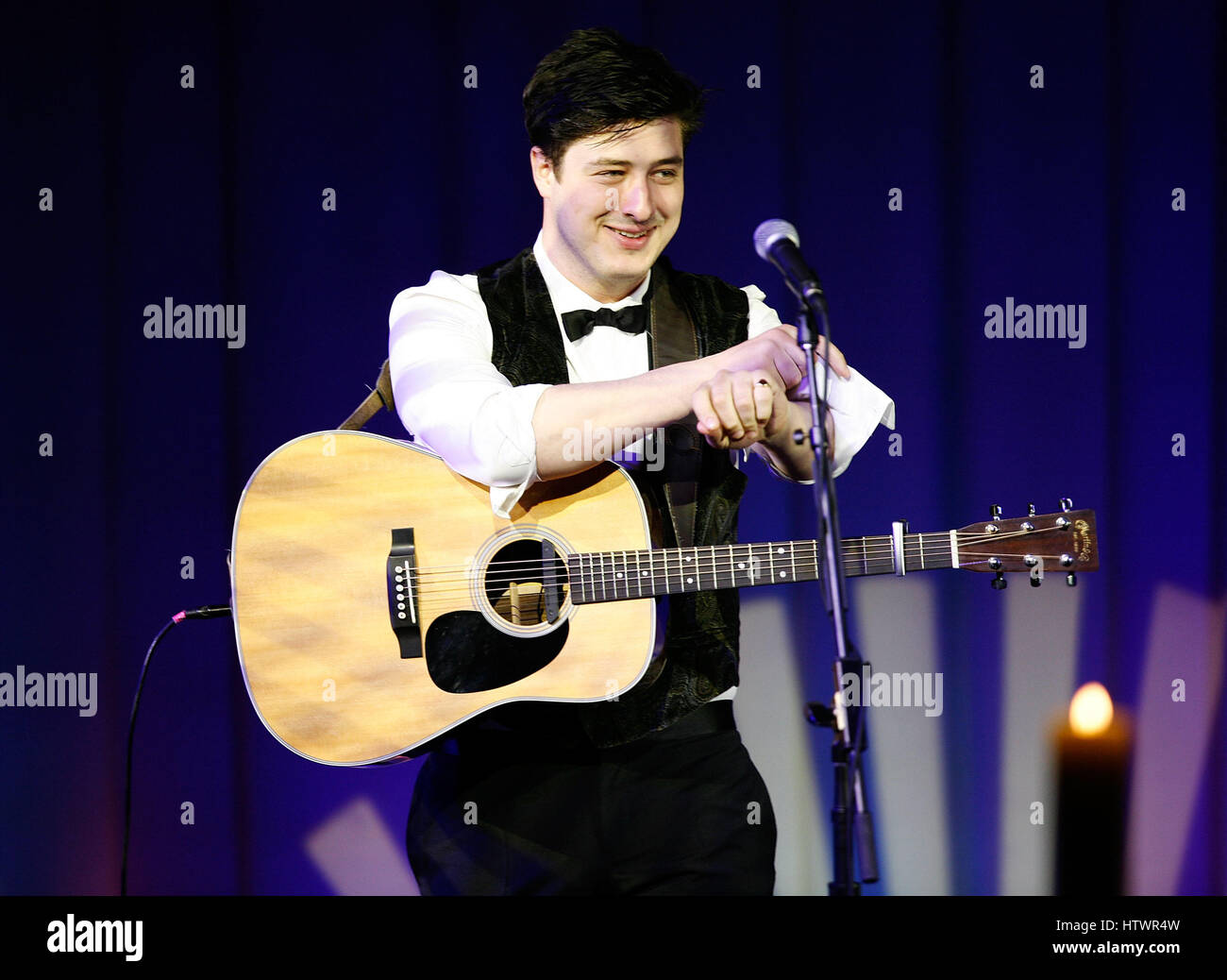Lead singer of the band Mumford & Sons, Marcus Mumford performs during ...