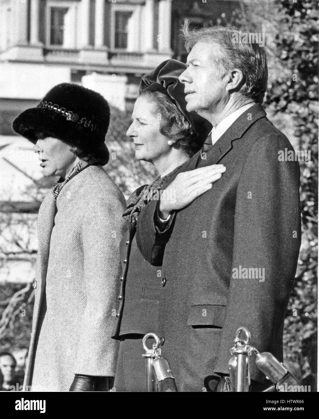 Prime Minister Margaret Thatcher of the United Kingdom, center, is ...