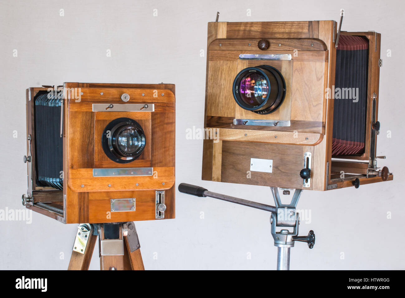 Two big old vintage camera set on white background Stock Photo - Alamy