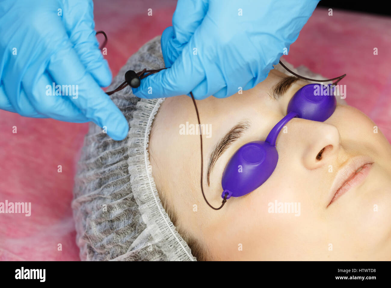 Laser removal of tattoo eyebrows. Shooting closeups. Cosmetic medical ...