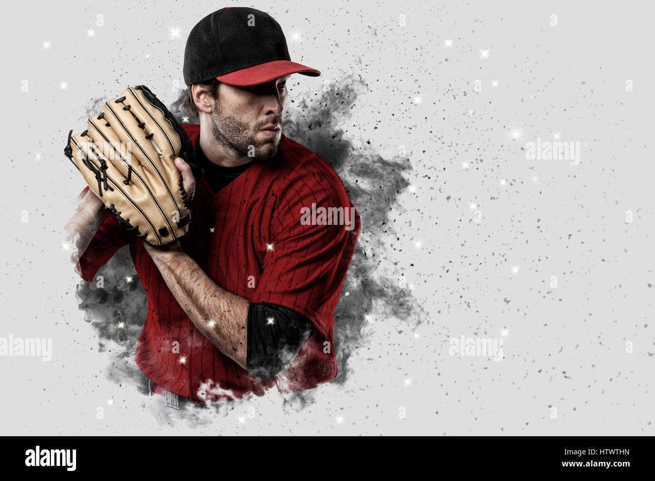 Pitcher Baseball Player with a red uniform coming out of a blast of ...