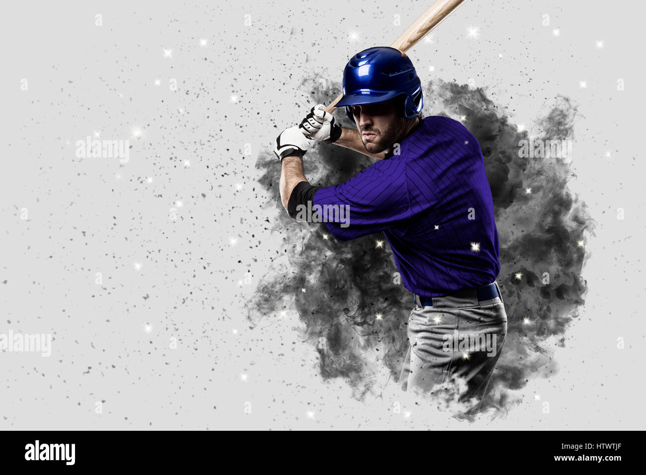 Baseball Player with a Blue uniform coming out of a blast of smoke ...