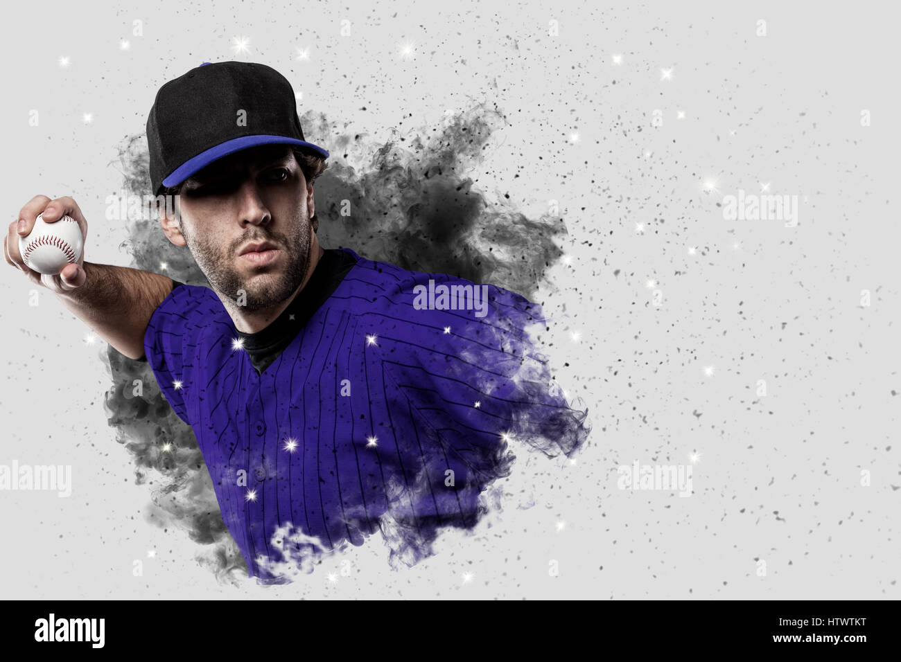 Baseball Player with a Blue uniform coming out of a blast of smoke ...