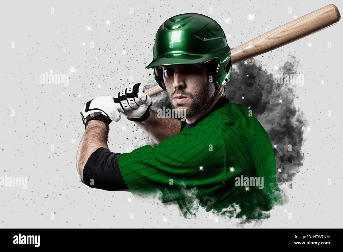 Baseball Player with a green uniform coming out of a blast of smoke ...