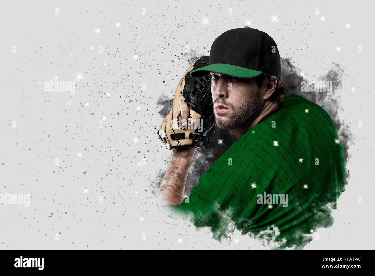 Pitcher Baseball Player with a green uniform coming out of a blast of ...