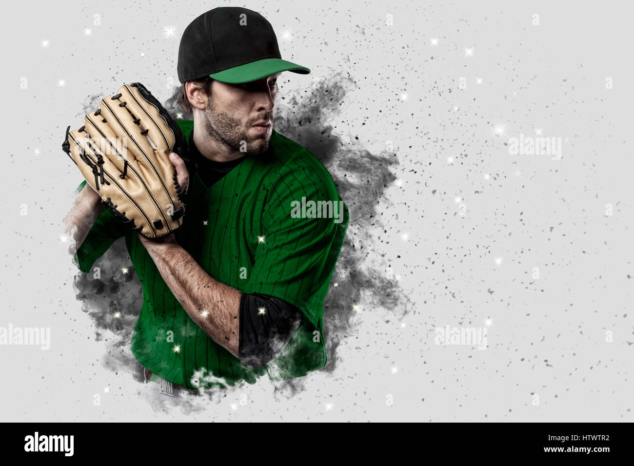 Pitcher Baseball Player with a green uniform coming out of a blast of ...