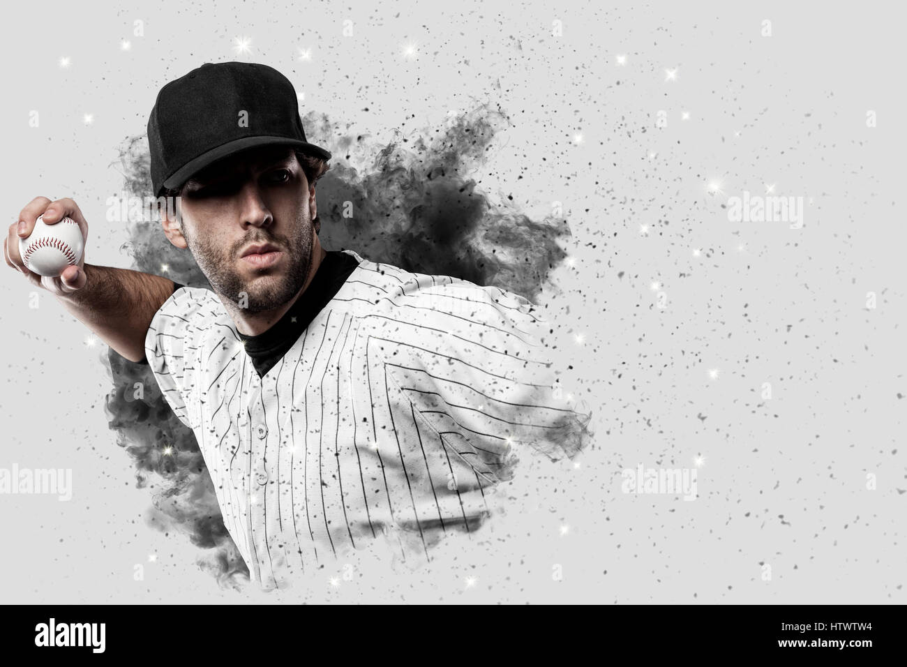 Baseball Player with a white uniform coming out of a blast of smoke ...