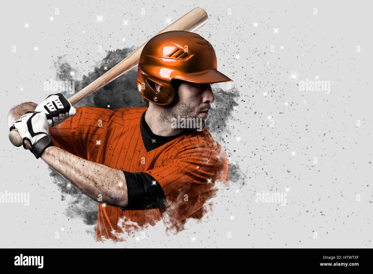 Baseball Player with a orange uniform coming out of a blast of smoke ...