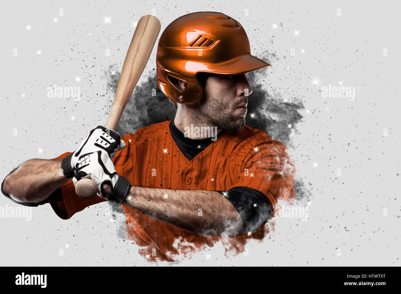 Baseball Player with a orange uniform coming out of a blast of smoke ...