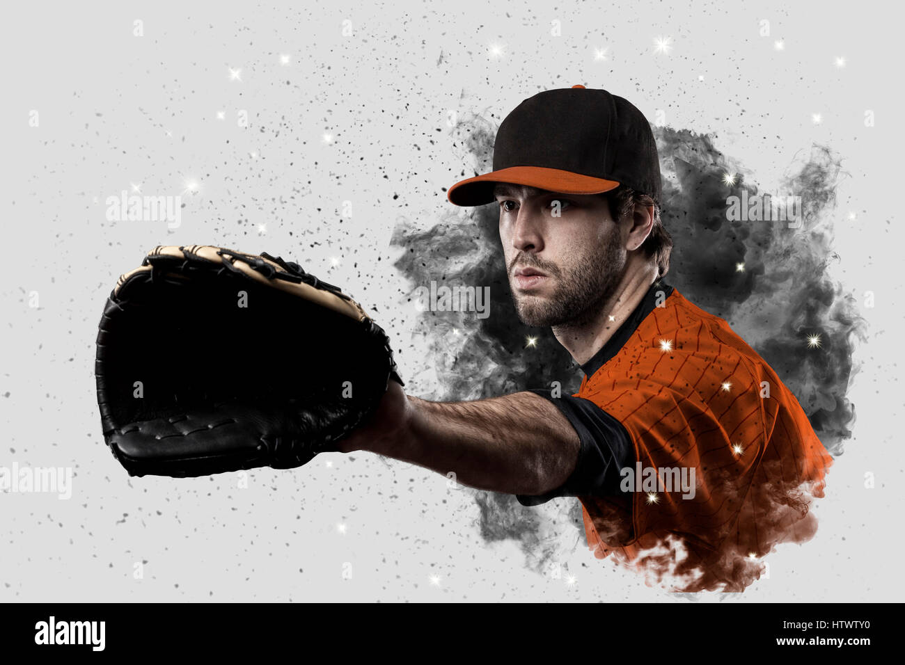 Baseball Player with a orange uniform coming out of a blast of smoke ...