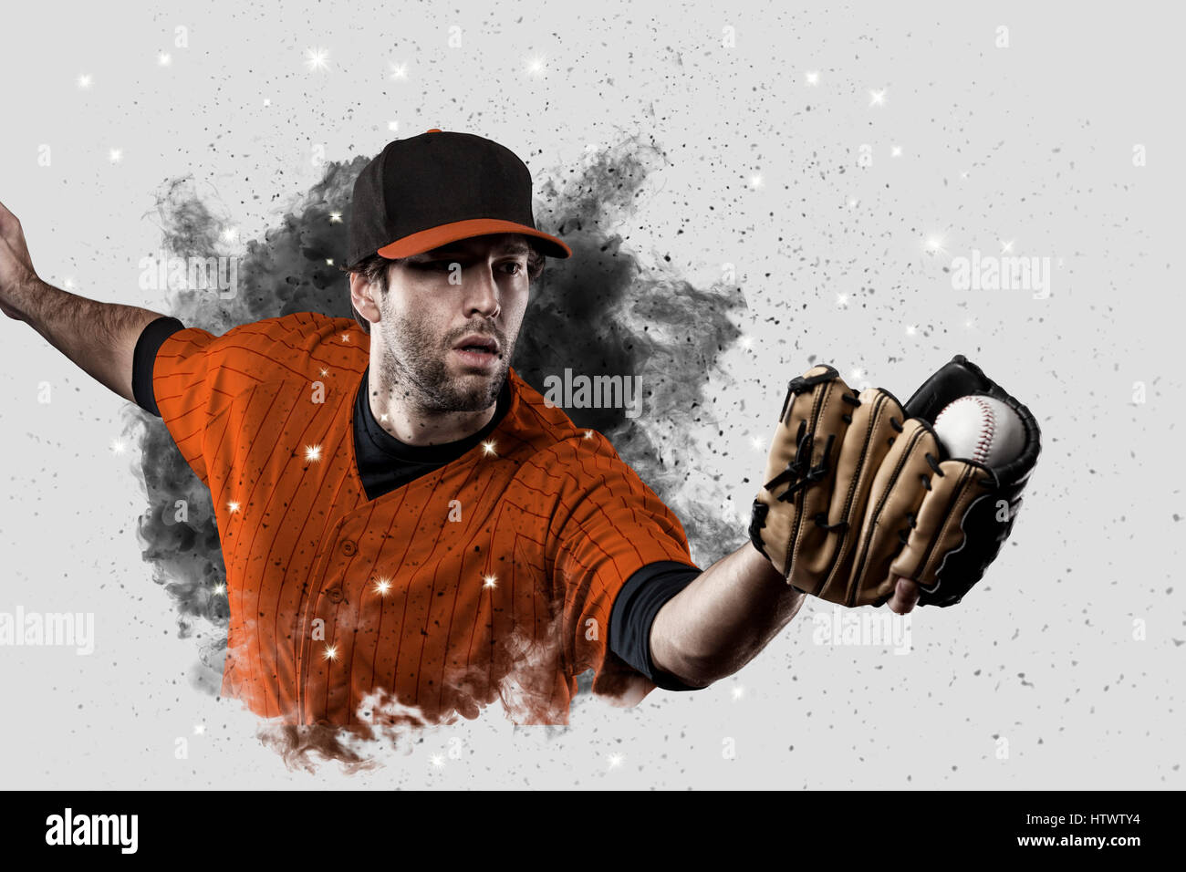 Baseball Player with a orange uniform coming out of a blast of smoke ...