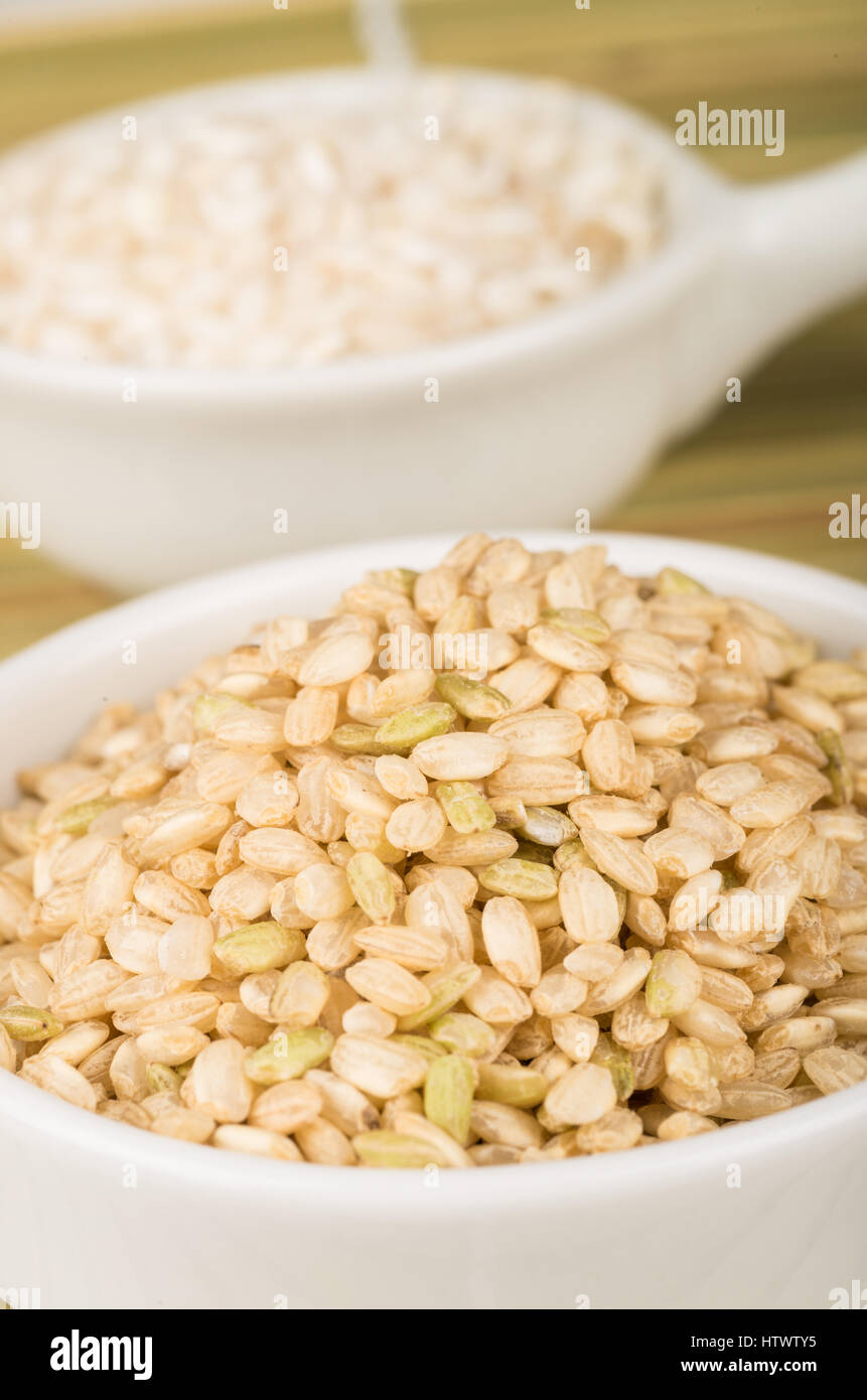 Whole and long grain white rice Stock Photo - Alamy