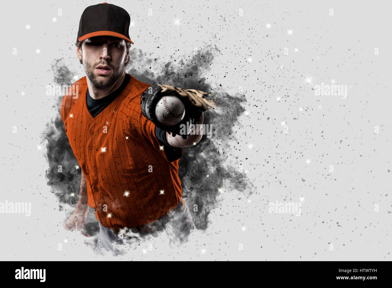 Baseball Player with a orange uniform coming out of a blast of smoke ...