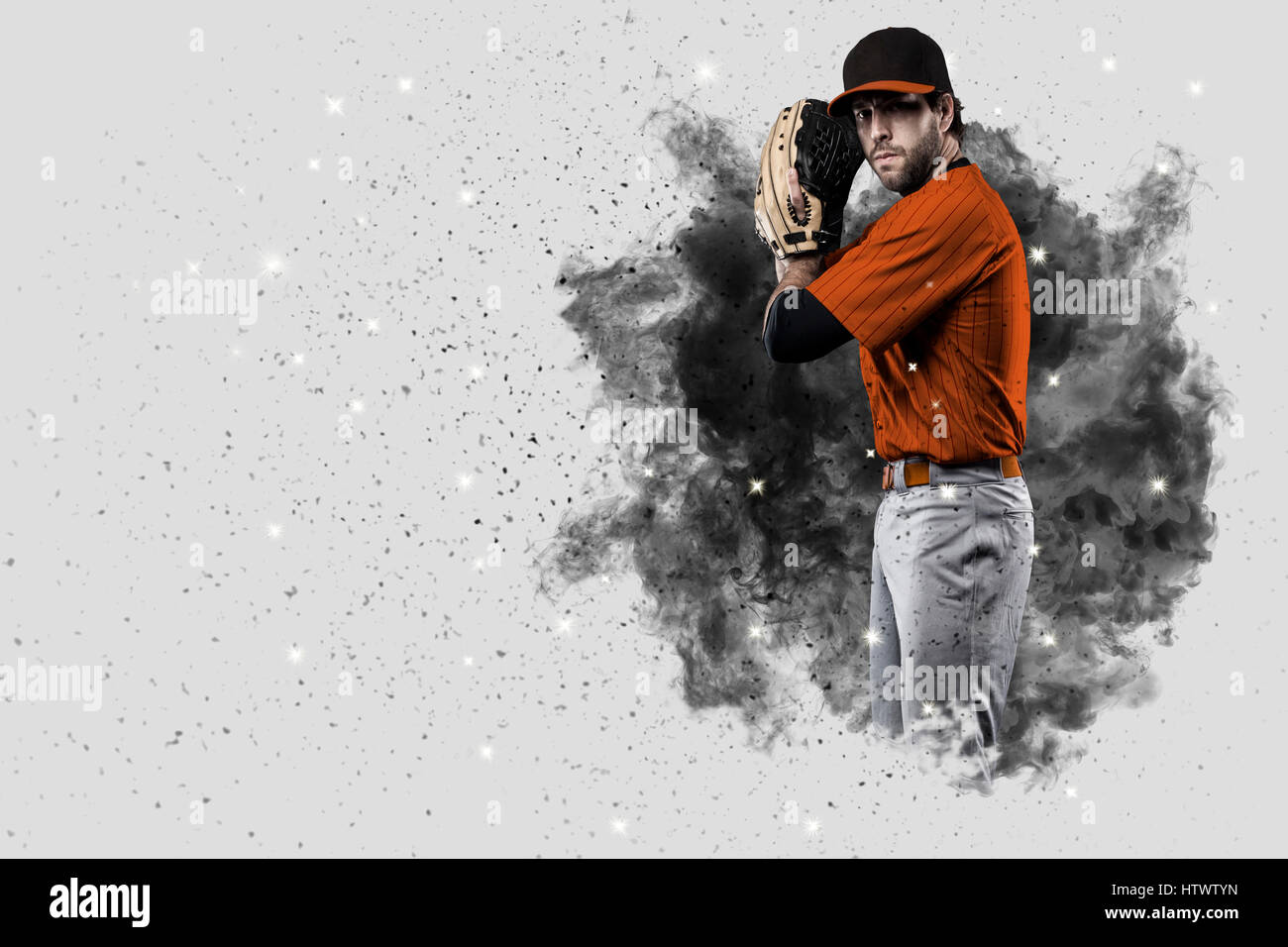 Pitcher Baseball Player with a orange uniform coming out of a blast of ...