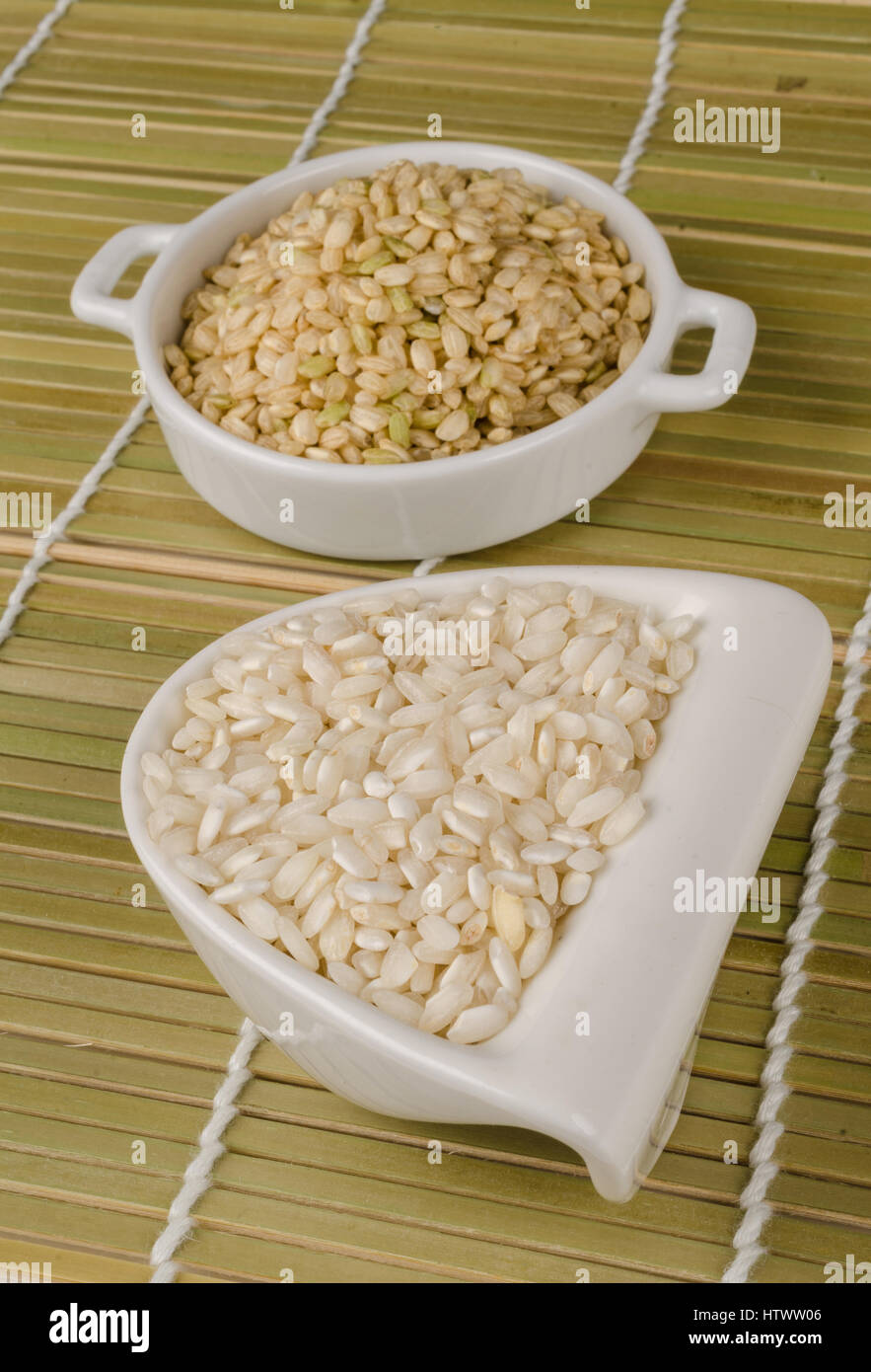 Whole and long grain white rice Stock Photo - Alamy