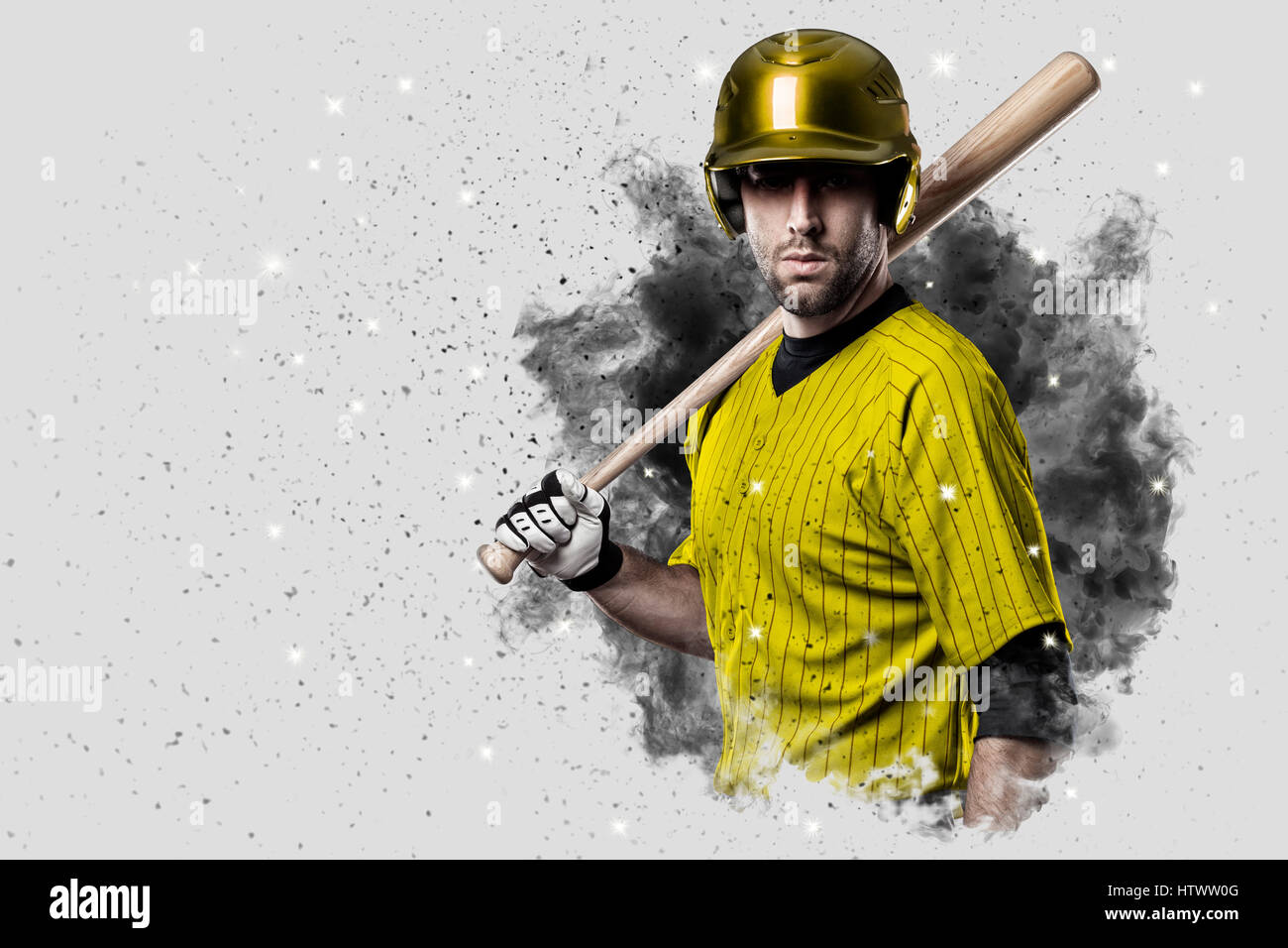 Baseball Player with a yellow uniform coming out of a blast of smoke ...