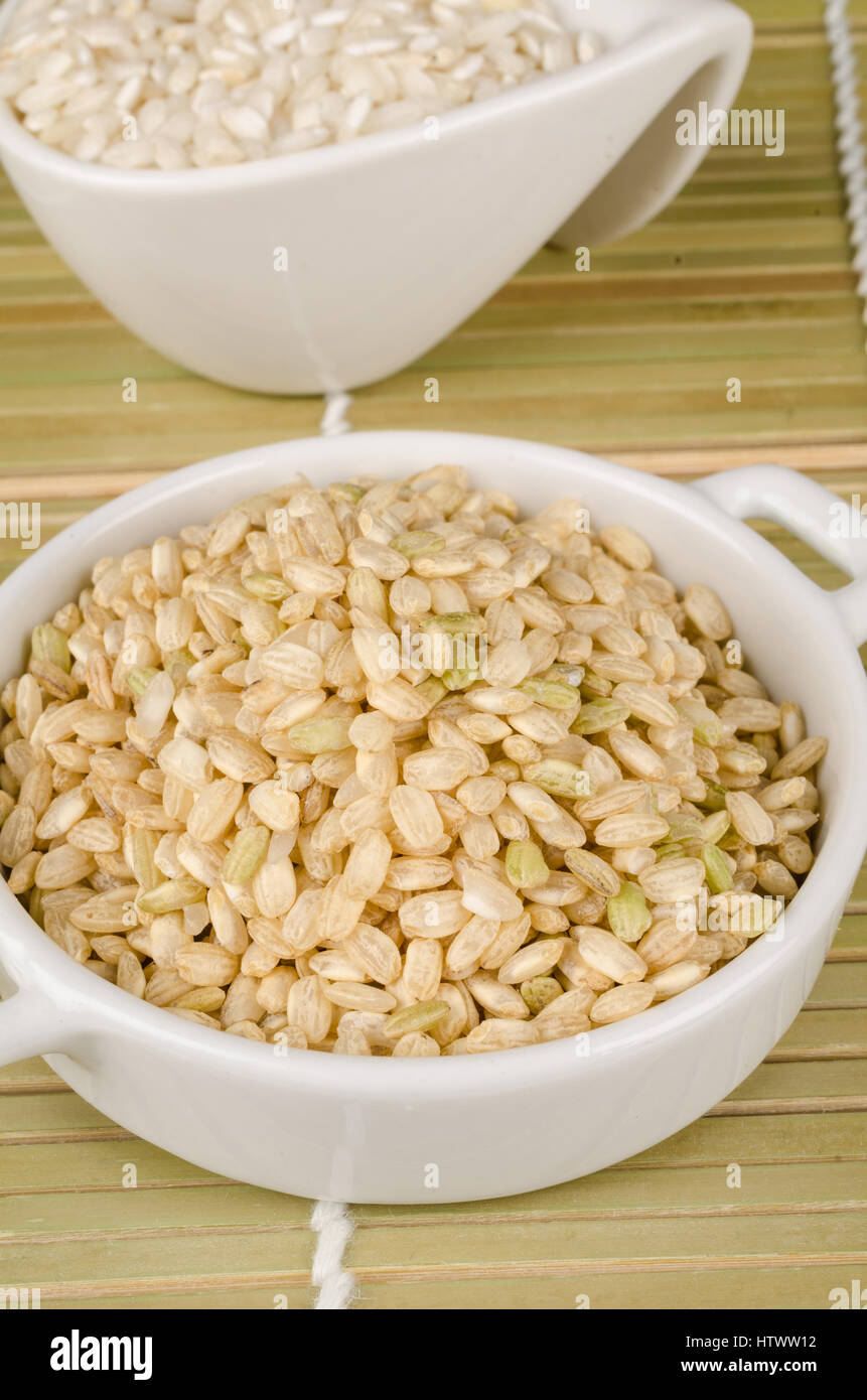 Whole and long grain white rice Stock Photo - Alamy