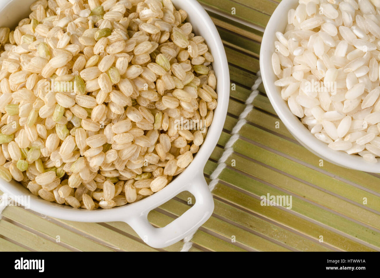 Whole and long grain white rice Stock Photo - Alamy