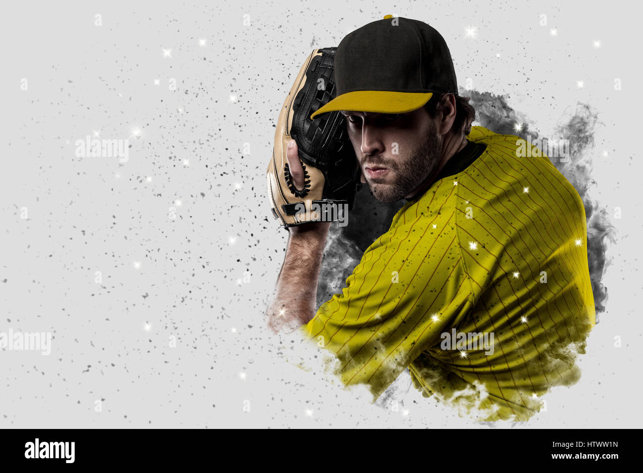 Pitcher Baseball Player with a yellow uniform coming out of a blast of ...