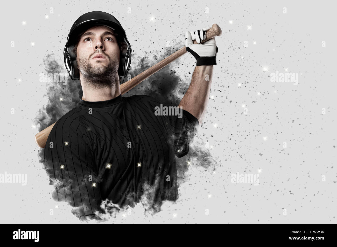Baseball Player with a black uniform coming out of a blast of smoke ...