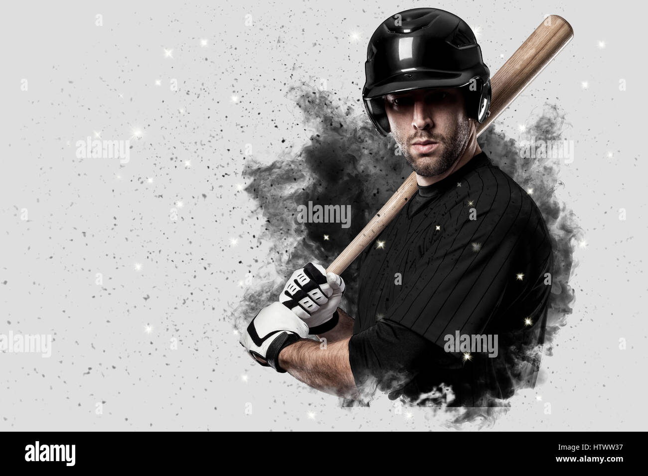 Baseball Player with a black uniform coming out of a blast of smoke ...