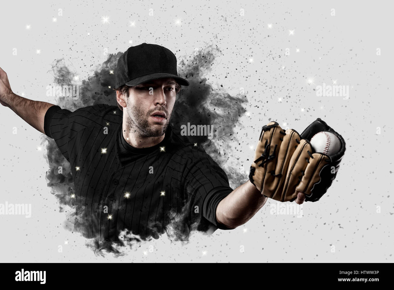 Baseball Player with a black uniform coming out of a blast of smoke ...