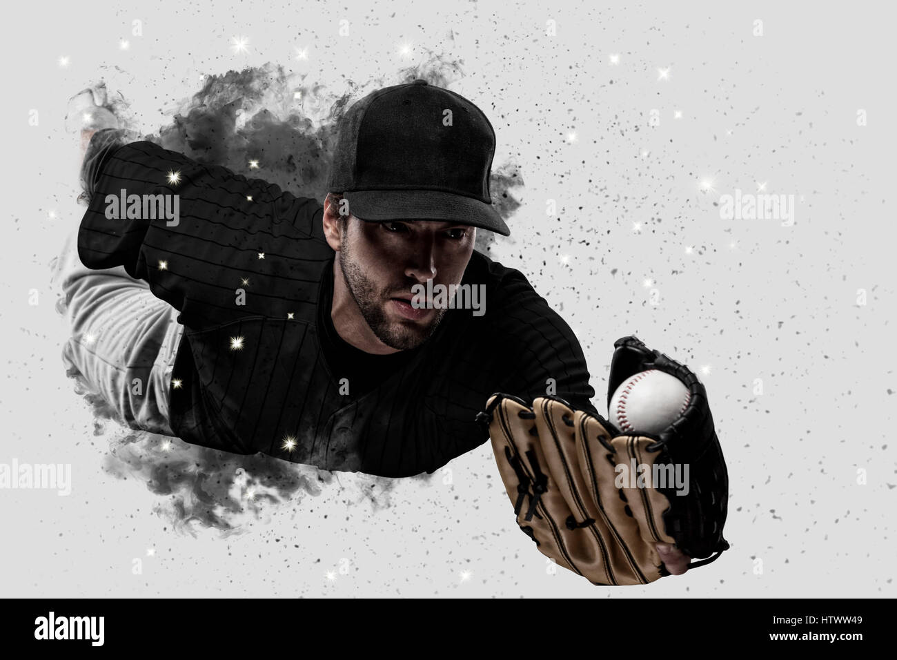 Baseball Player with a black uniform coming out of a blast of smoke ...