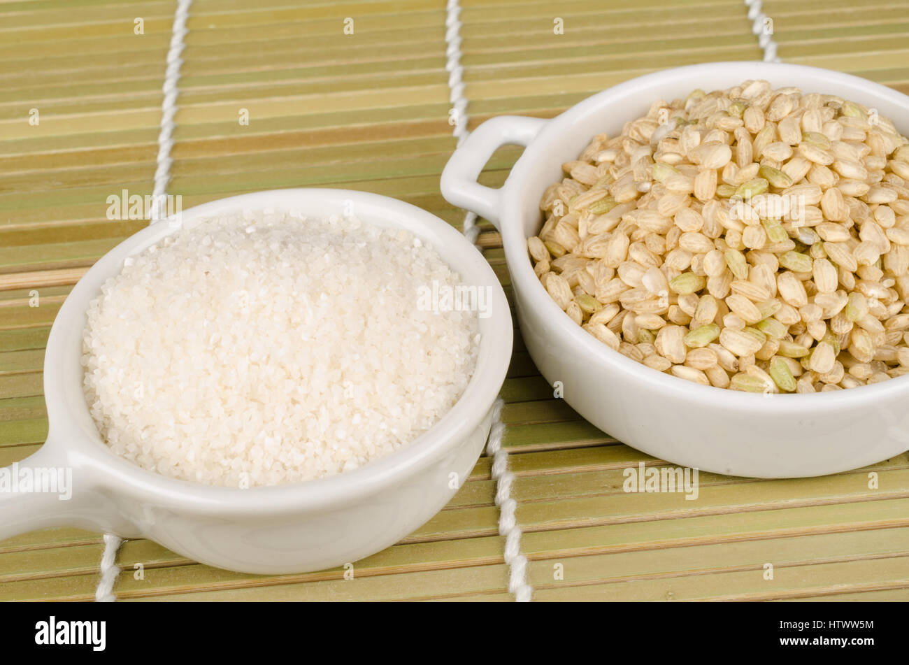 Whole rice and rice semolia in a studio shot Stock Photo - Alamy