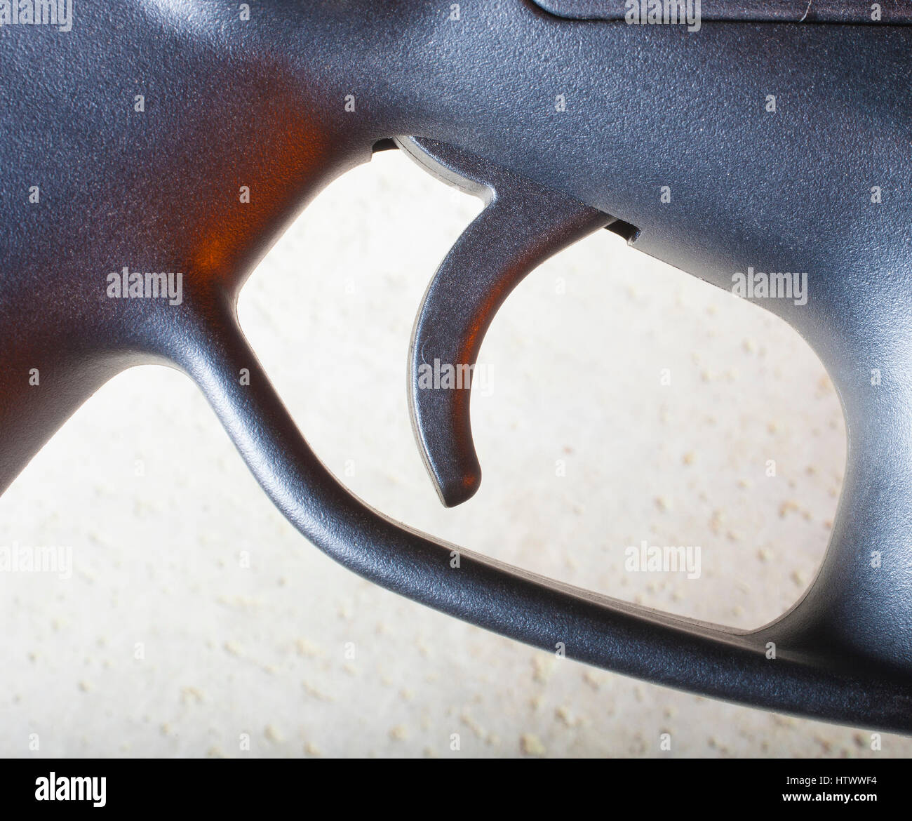 Polymer framed rifle strigger with orange light from the side Stock ...