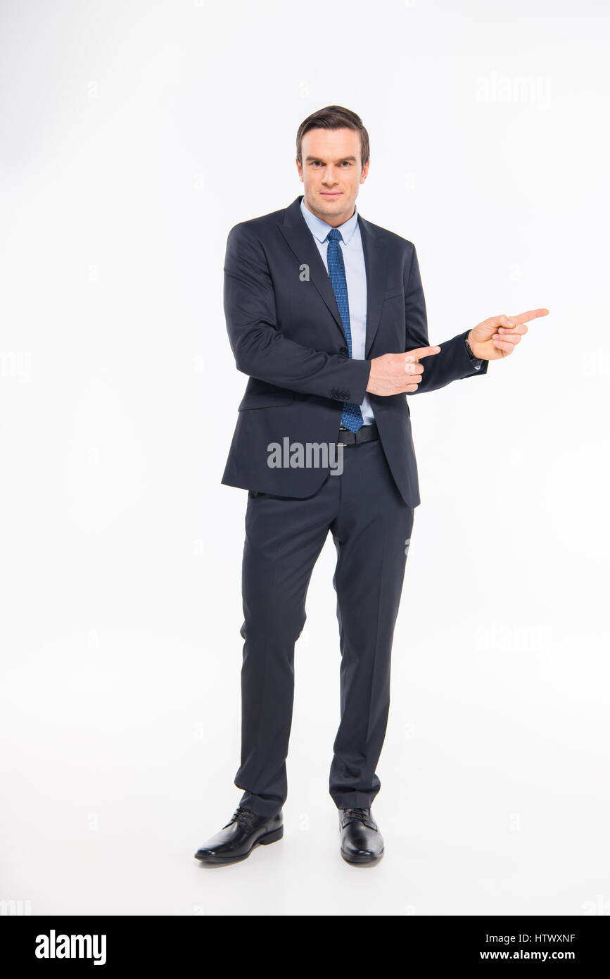 Professional businessman pointing Stock Photo - Alamy