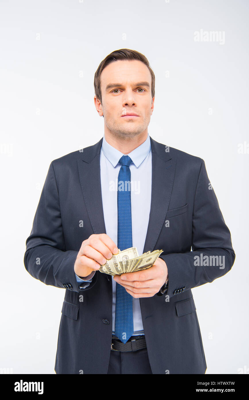 Young businessman with money Stock Photo - Alamy