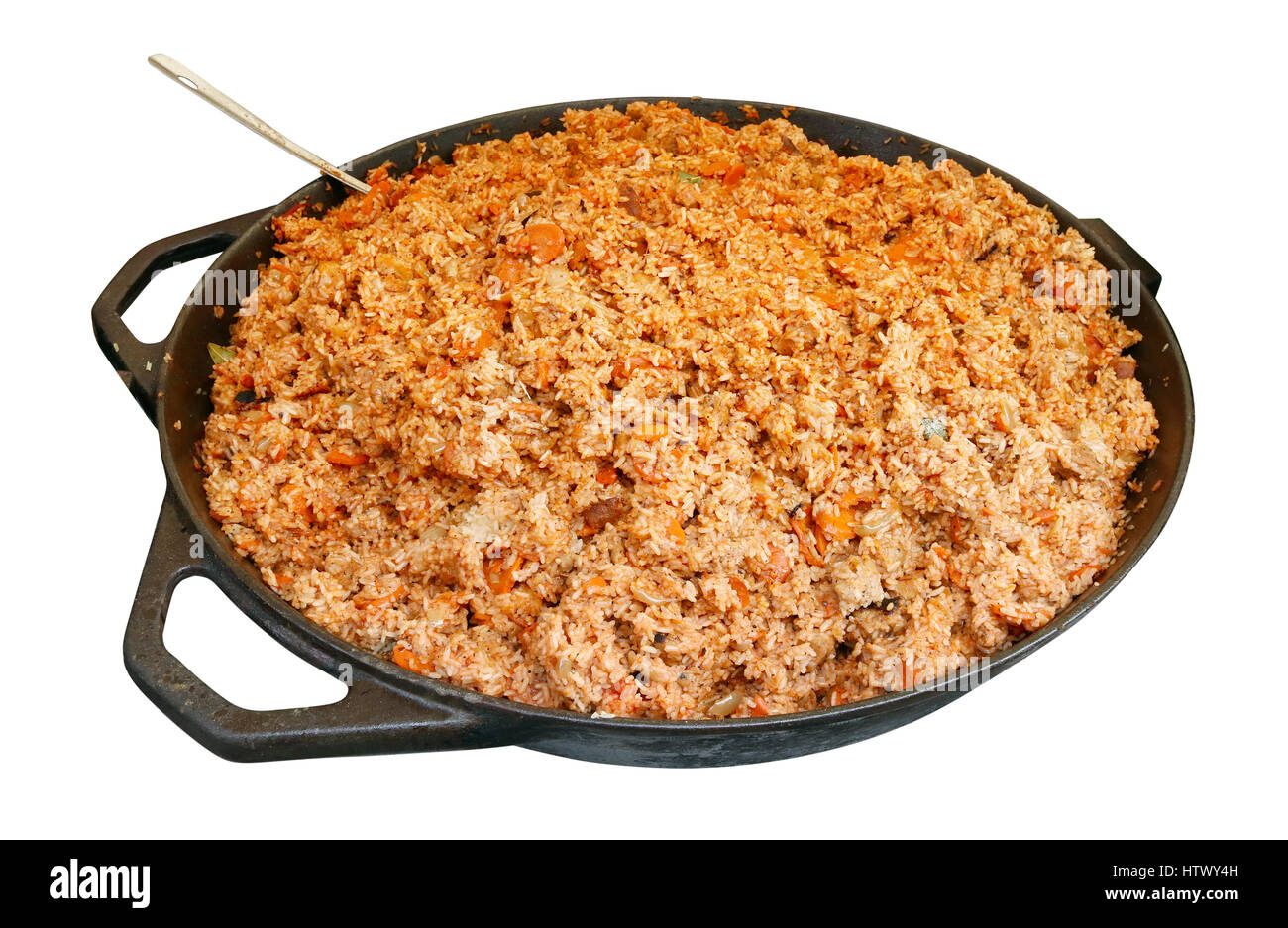 Fast food of the big city - metal big frying pan with red hot fat pilaf ...