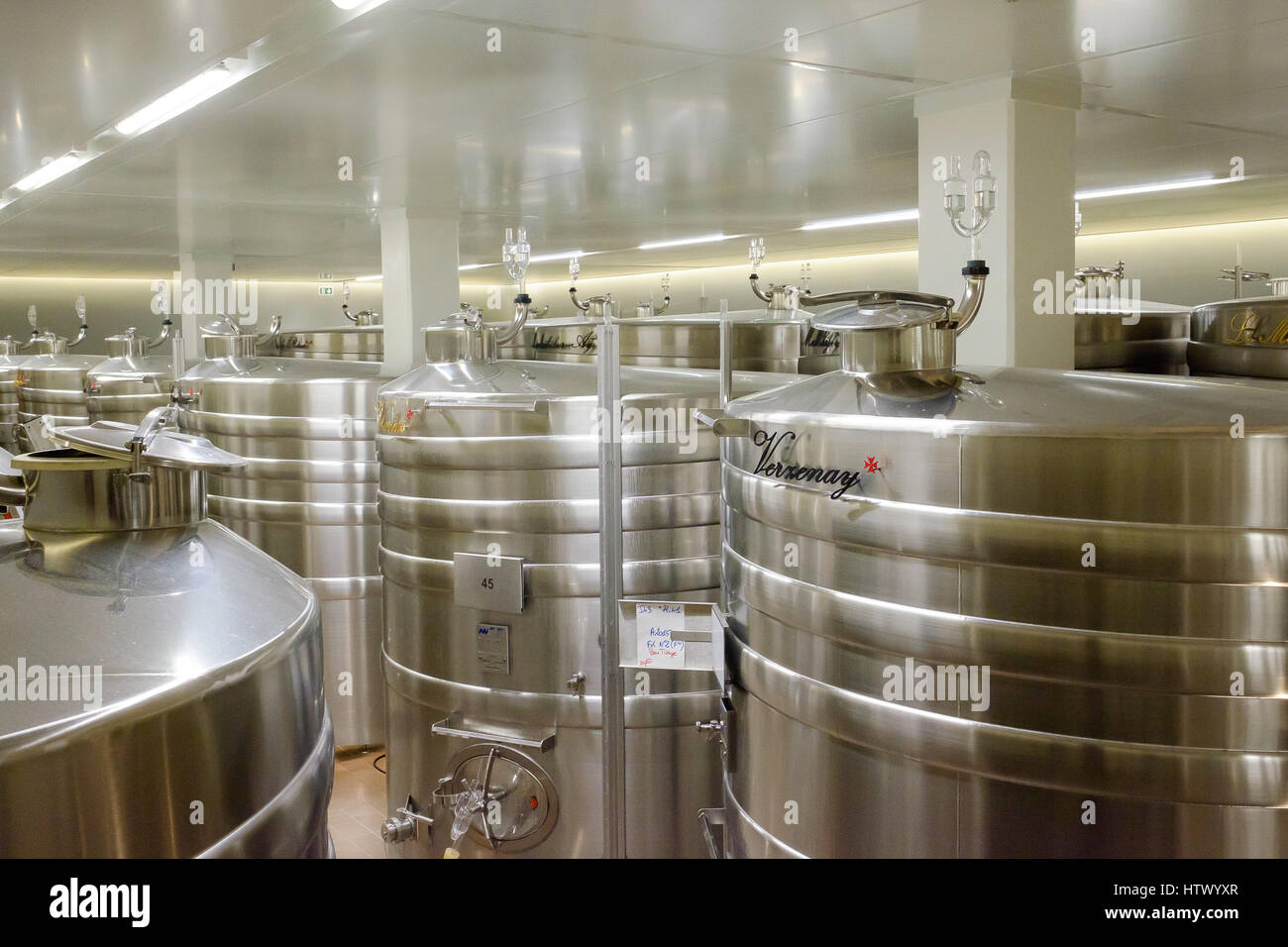 Champagne fermenting in stainless-steel vats at Lanson Champagne, Reims ...