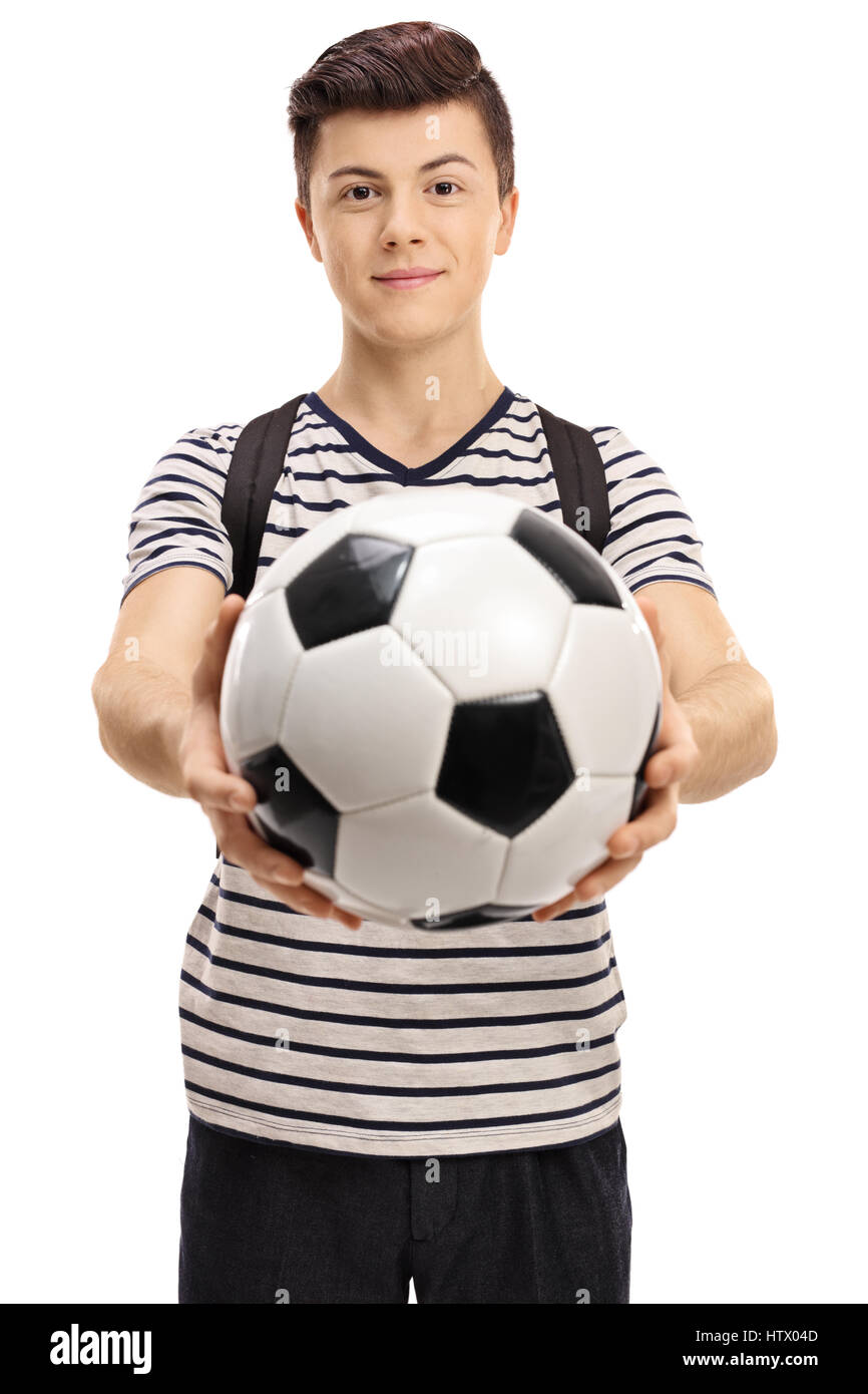 Teenage student with a football isolated on white background Stock ...
