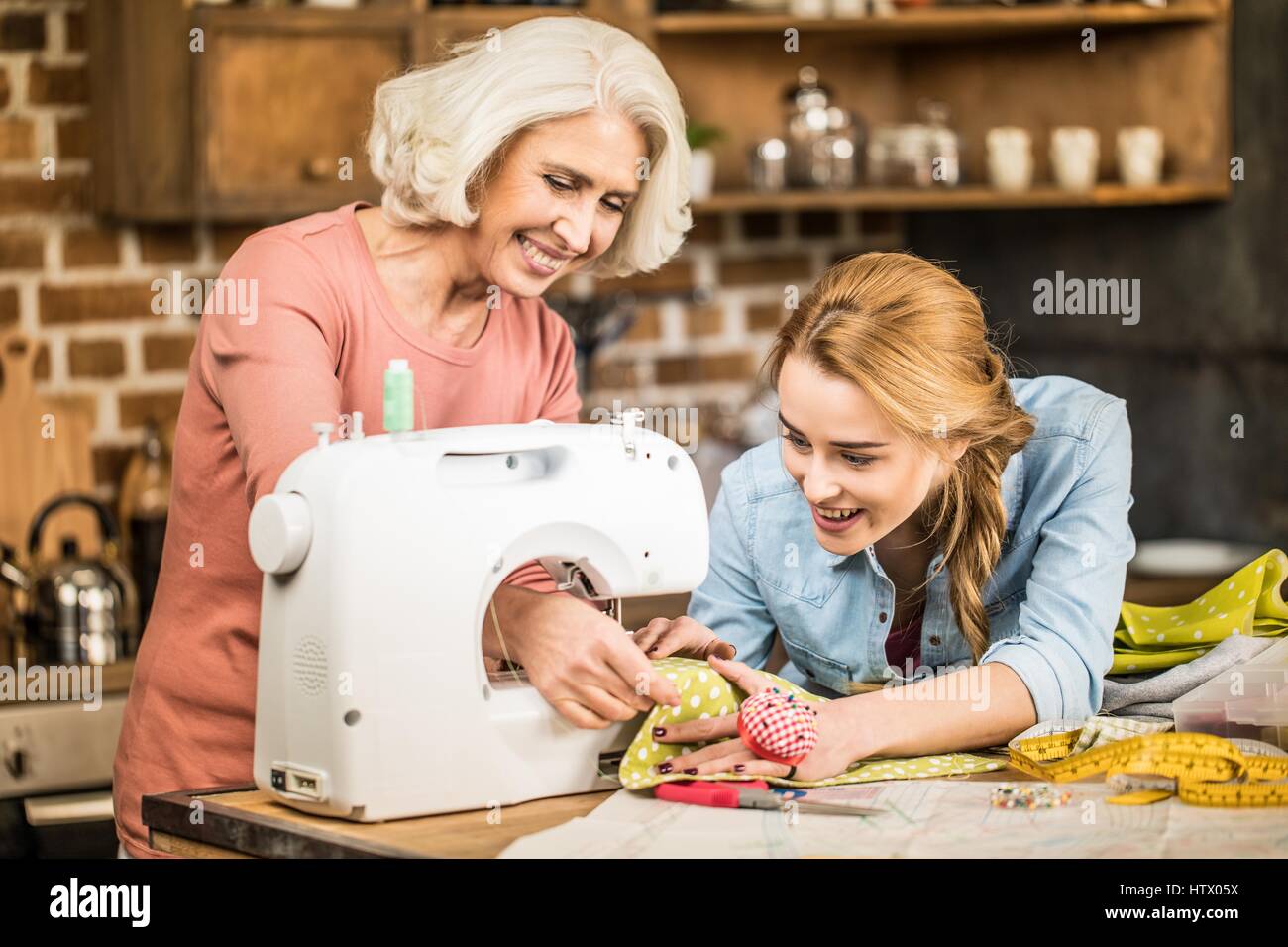 Women using sewing machine Stock Photo - Alamy