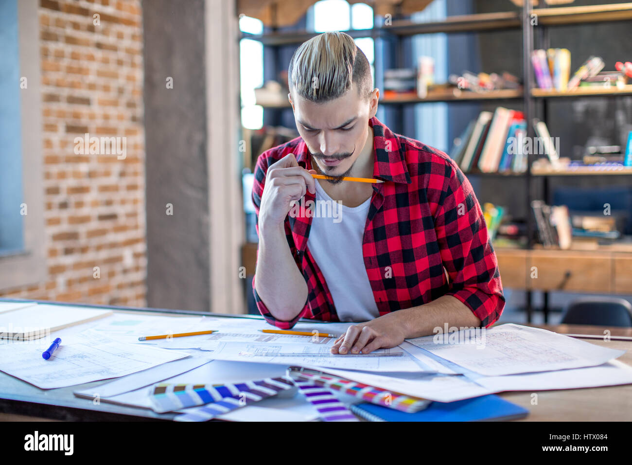 Male architect with blueprints Stock Photo - Alamy
