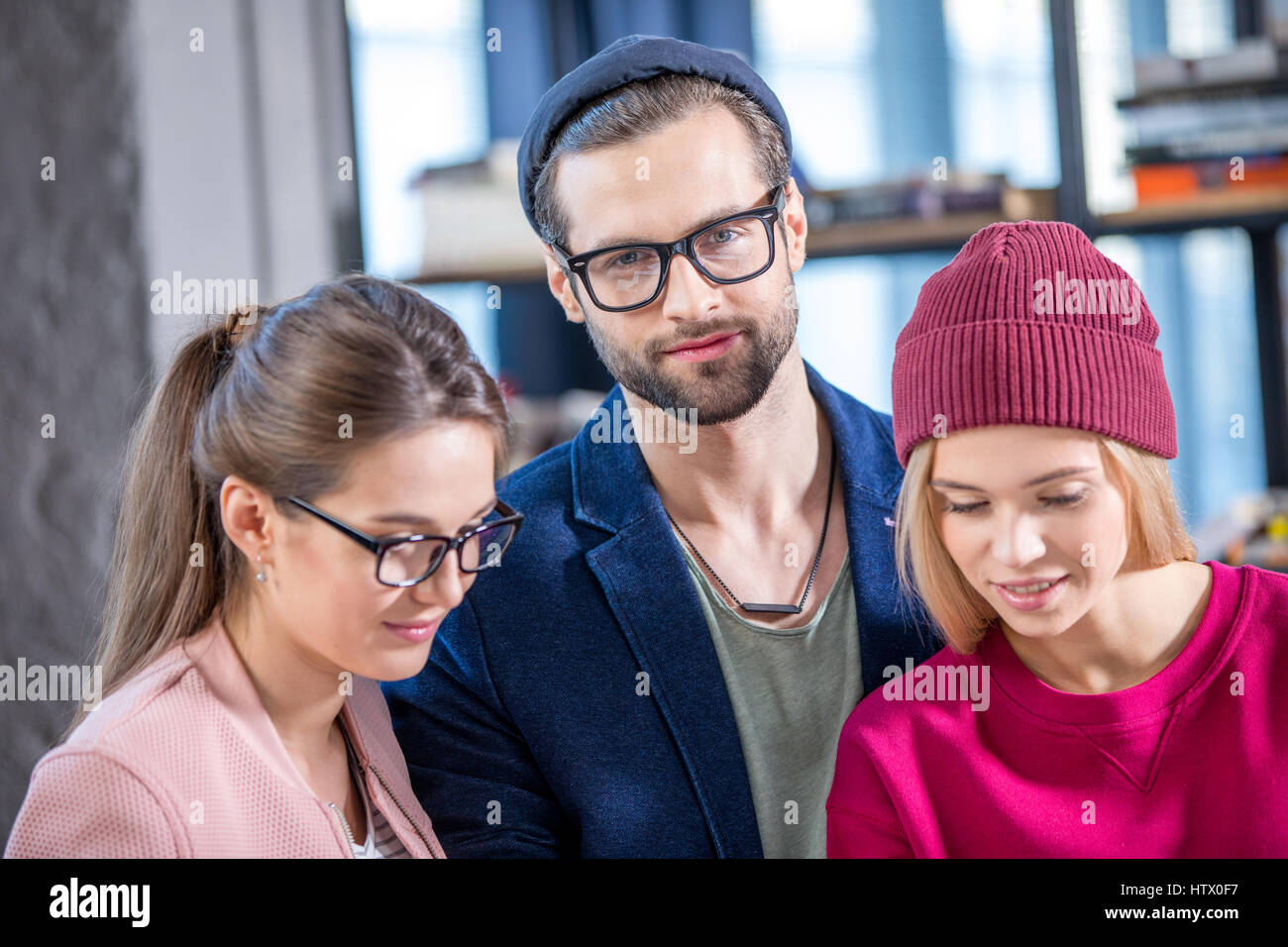 Group young creative coworkers hi-res stock photography and images - Alamy