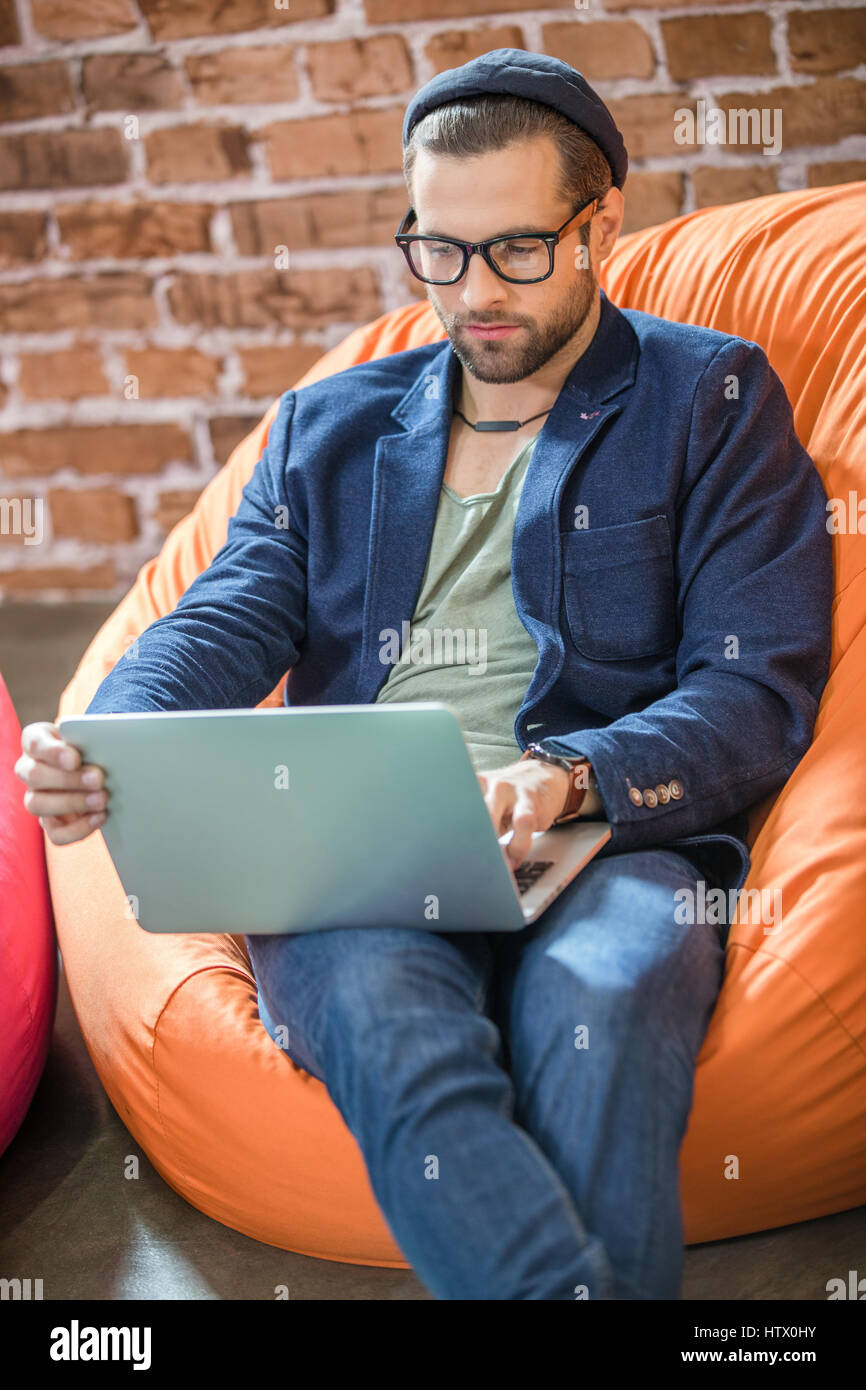 Man working on laptop Stock Photo - Alamy