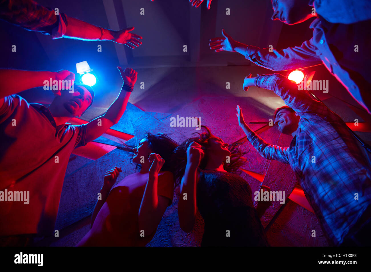Young dancers having fun in the night club Stock Photo - Alamy
