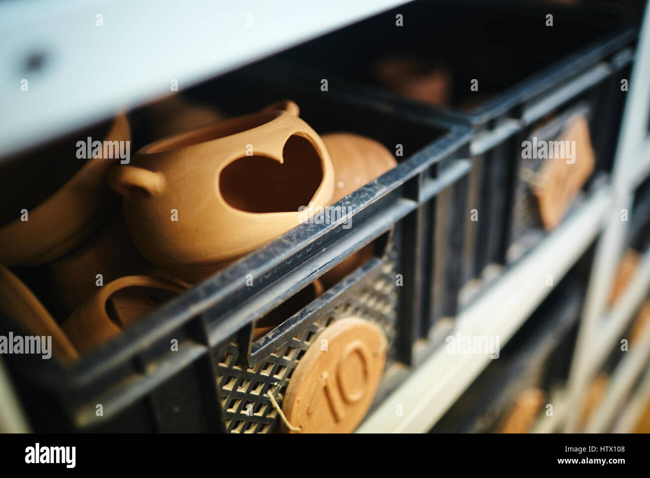 Various clay items in plastic box Stock Photo - Alamy