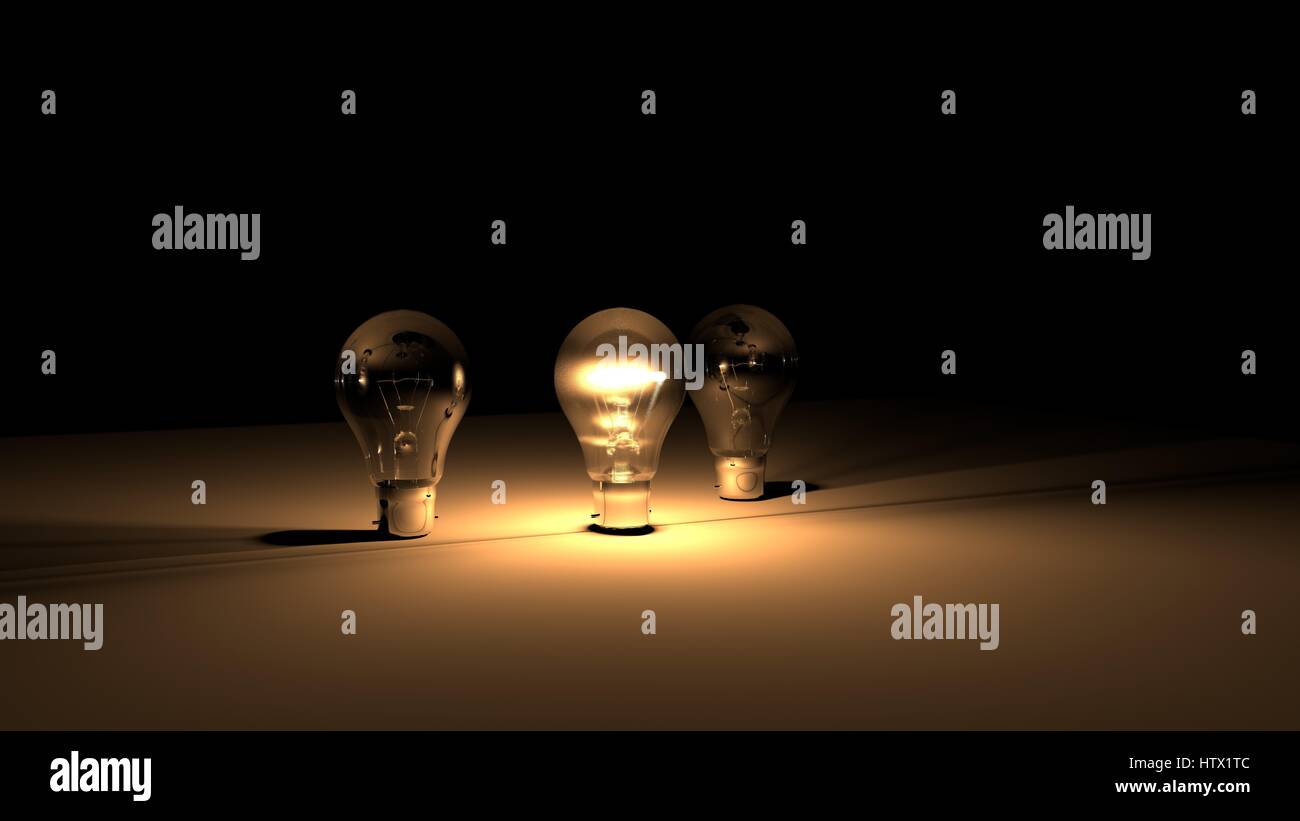 Three light bulbs, one lit up Stock Photo - Alamy