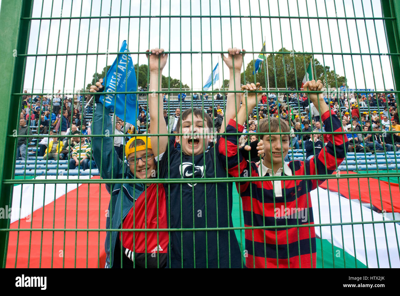 Rugby test match Italy-Argentina. Young italian supporters on the ...